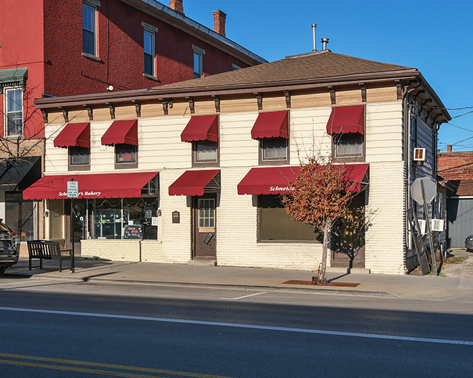 Red awnings and old-school charm signal serious baking happening behind these welcoming windows and doors.