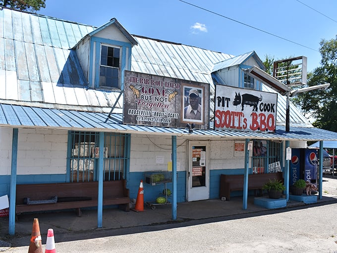 Scott's Bar-B-Que's weathered blue building stands as a monument to smoke, time, and tradition.