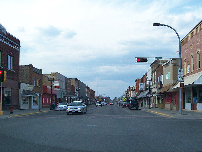 Small-town serenity meets practical living - where church spires guide you to community and savings.