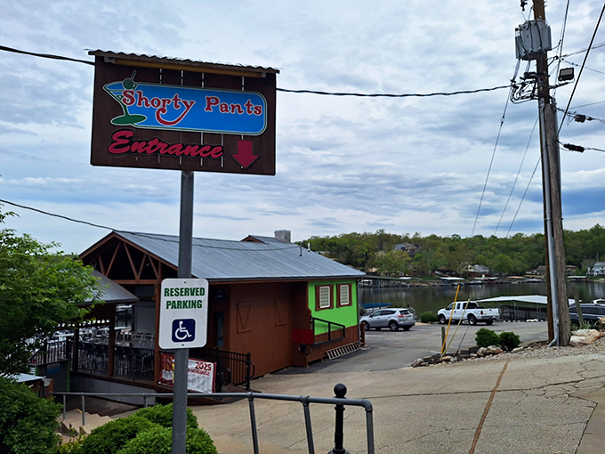 Nothing says "lakeside dining" quite like a rustic sign promising good times and even better seafood.