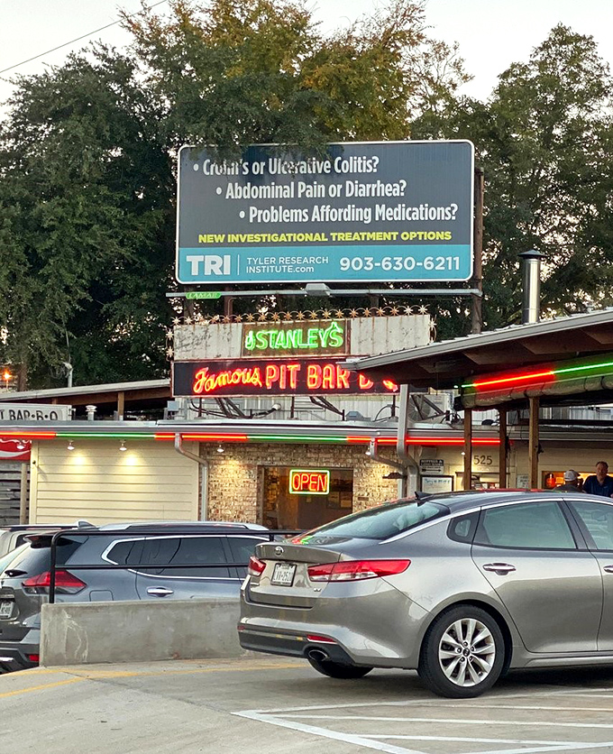 Stanley's vintage neon glow has been calling barbecue pilgrims home for decades of smoky satisfaction.