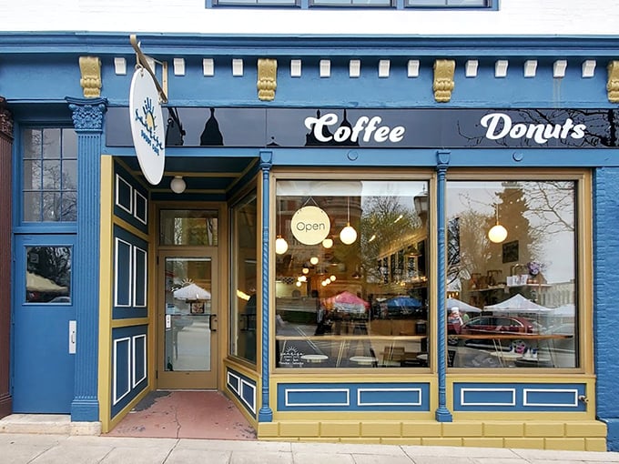 Blue and gold never looked so appetizing - this charming storefront beckons like a beacon of breakfast bliss.