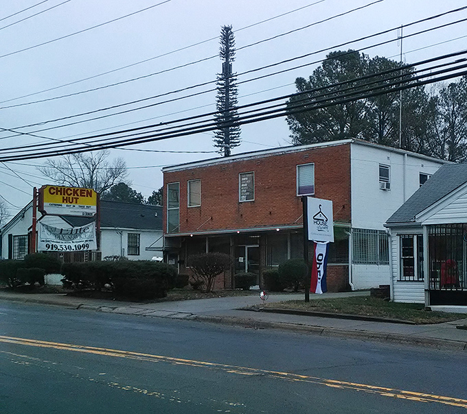 The Chicken Hut's classic roadside charm reminds you that simple buildings often hide extraordinary flavors.