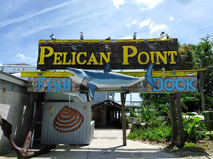 Pelican Point's colorful entrance promises the kind of authentic fish dock experience dreams are made of.