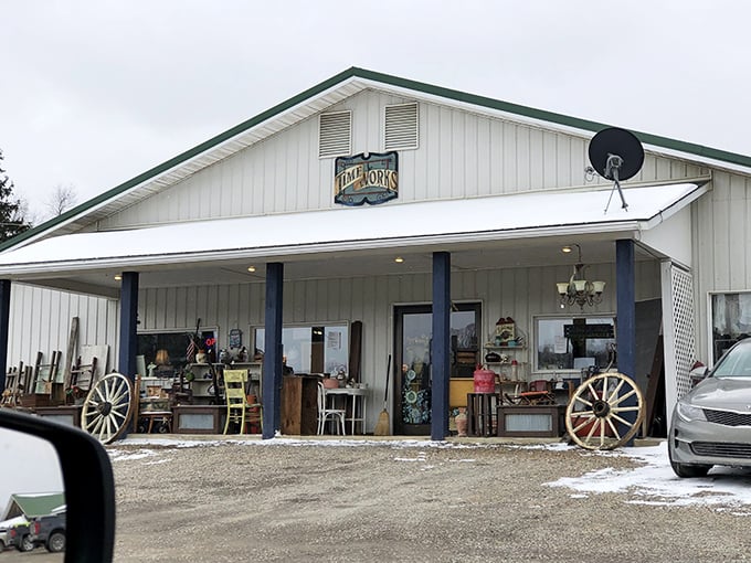 TimeWorks sits pretty under that covered porch, displaying wagon wheels like outdoor art installations.