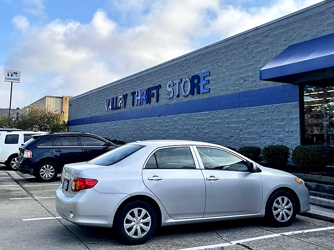Valley Thrift Store's bold blue lettering against gray brick creates an unmistakable beacon for Cincinnati's deal-seeking adventurers.