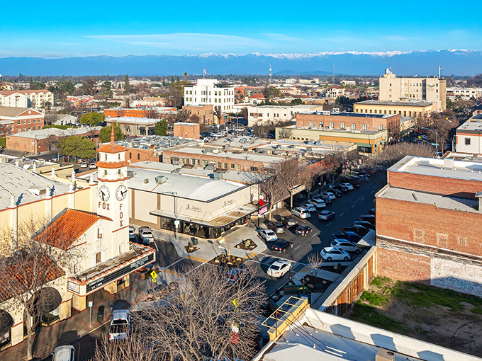 Snow-capped Sierra peaks provide the backdrop for Visalia's charming downtown, where small-town hospitality meets big mountain views.