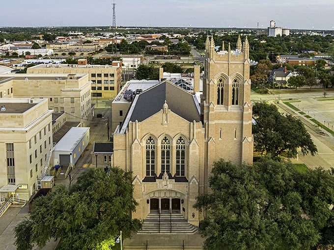 Gothic architecture rises majestically above the trees, proving small towns have big character too.
