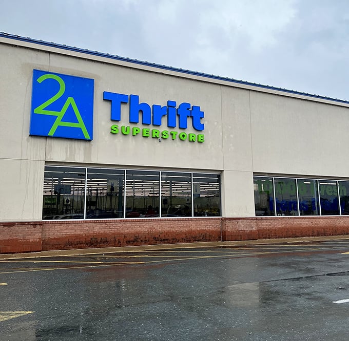 That modern storefront design whispers sophistication while the prices inside practically shout "incredible deals" to everyone.