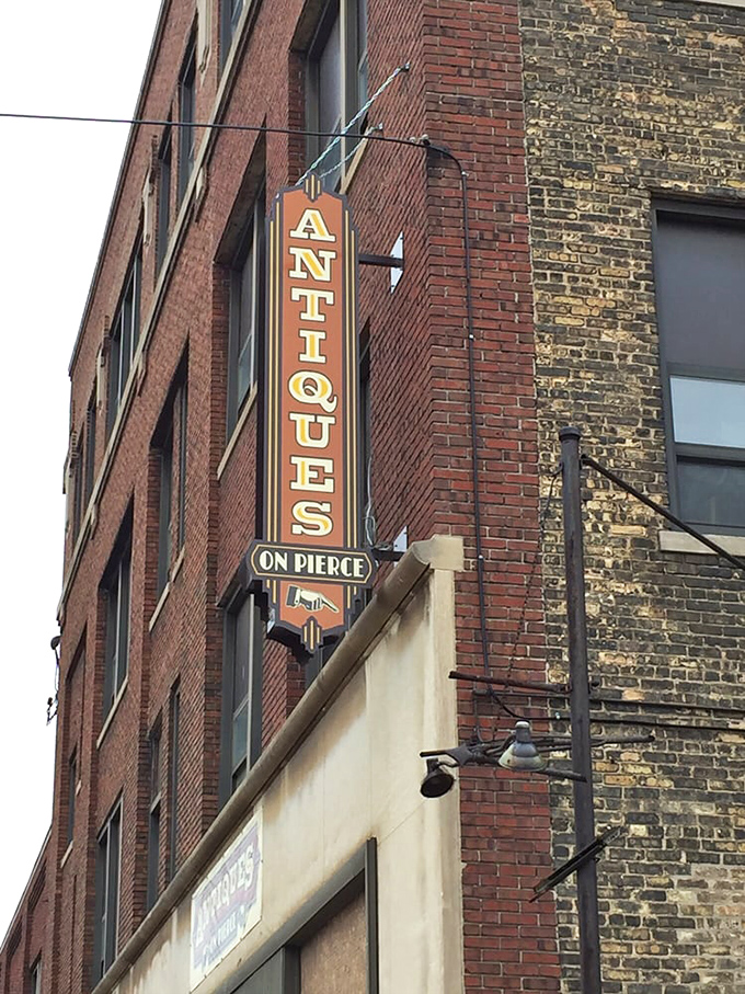 The vertical vintage experience! This towering sign beckons collectors into a multi-story maze of Milwaukee's finest antiques.