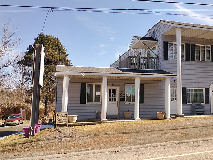 This modest building houses discount dreams that locals whisper about. Small-town charm meets big-time savings behind these doors.