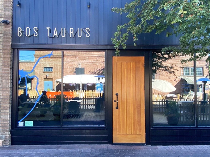 Modern steakhouse design that says "we're serious about beef" without saying a single word out loud.