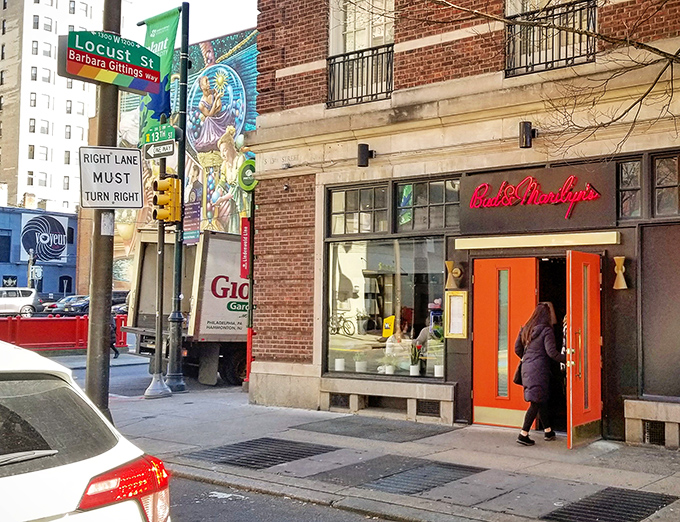 The warm glow of Bud & Marilyn's entrance promises a retro-cool experience where comfort food meets craft cocktails in perfect harmony.