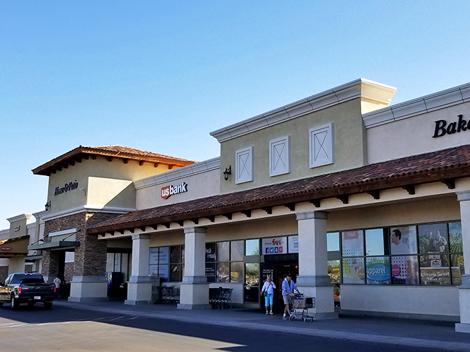 Spanish tile roofs and desert landscaping blend beautifully in this shopping district.