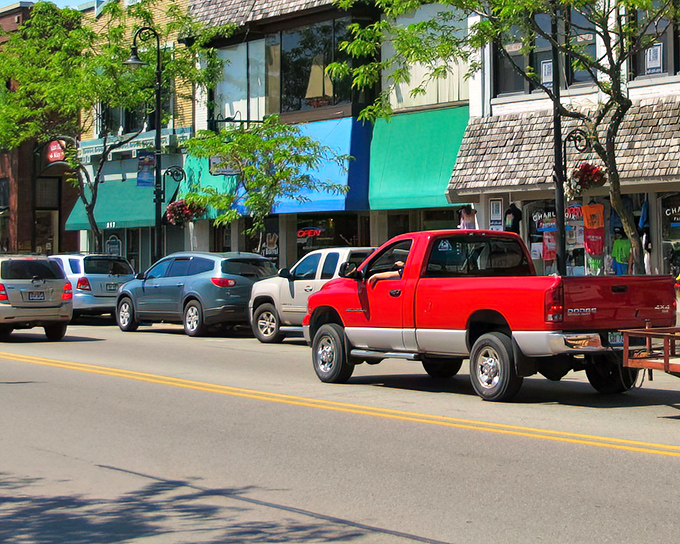 The heart of Charlevoix welcomes with tree-lined streets and classic architecture. Like stepping into a Norman Rockwell painting with better coffee.