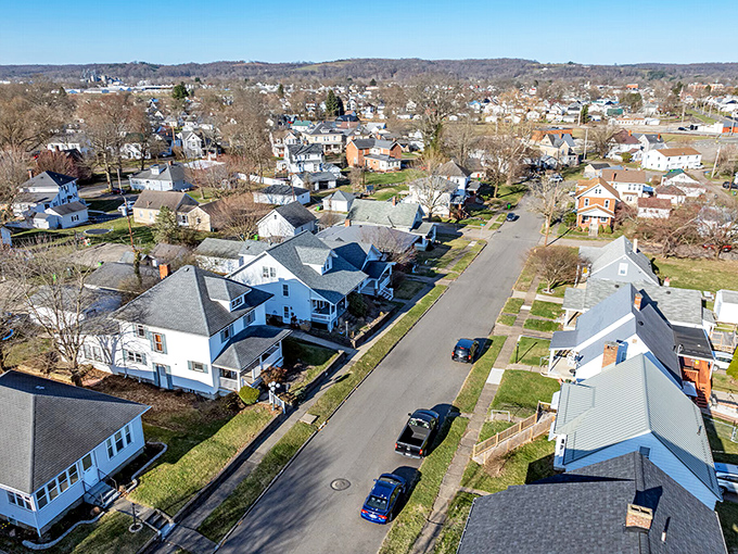 An aerial view of this riverside community shows how neatly it nestles into the surrounding countryside, like a town from a model railroad.