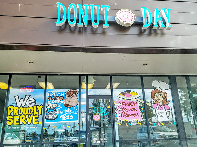 With vibrant window art featuring a chef character and promises of "fancy" and "premium" options, Donut Day brings a splash of color to Beaverton's donut scene.