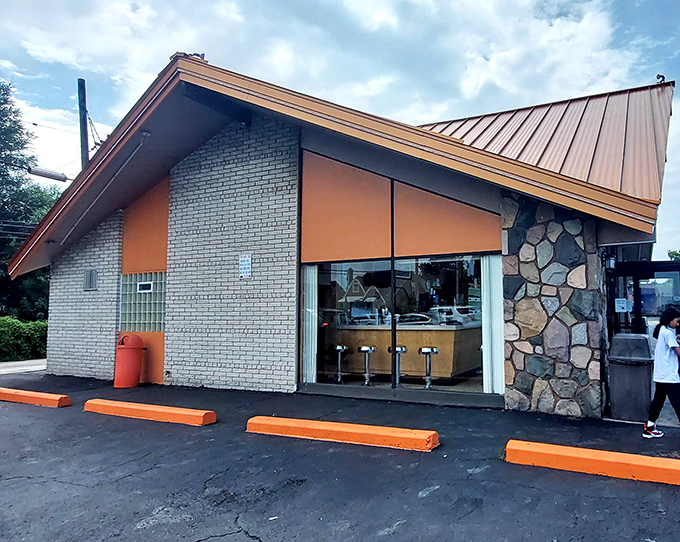 That sleek exterior design promises something special inside, where traditional techniques meet contemporary donut shop excellence and innovation.