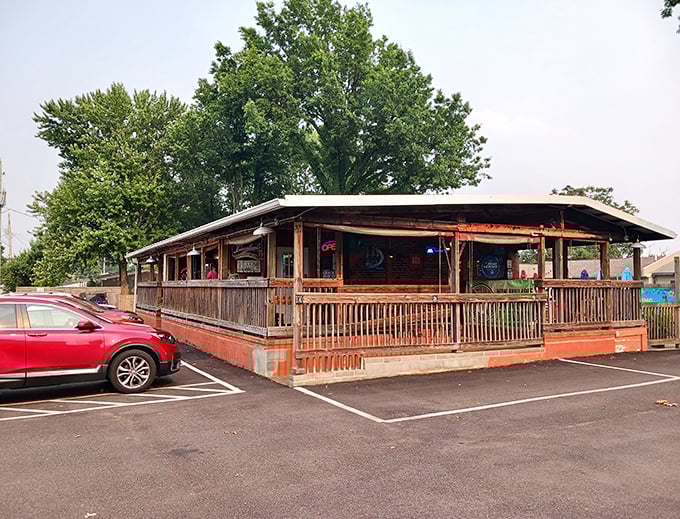 The wooden deck at Eadies invites you to savor Lake Erie's finest catches while contemplating life's simpler pleasures.