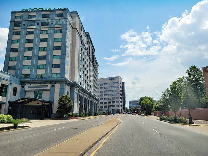 Stately buildings stand sentinel over streets where past and present shake hands like old friends.