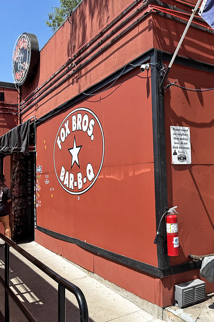 This corner spot's vibrant exterior promises the kind of finger-licking goodness that builds neighborhood legends.