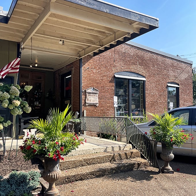 The charming entrance with its patriotic flag feels like stepping into a Norman Rockwell painting come alive.