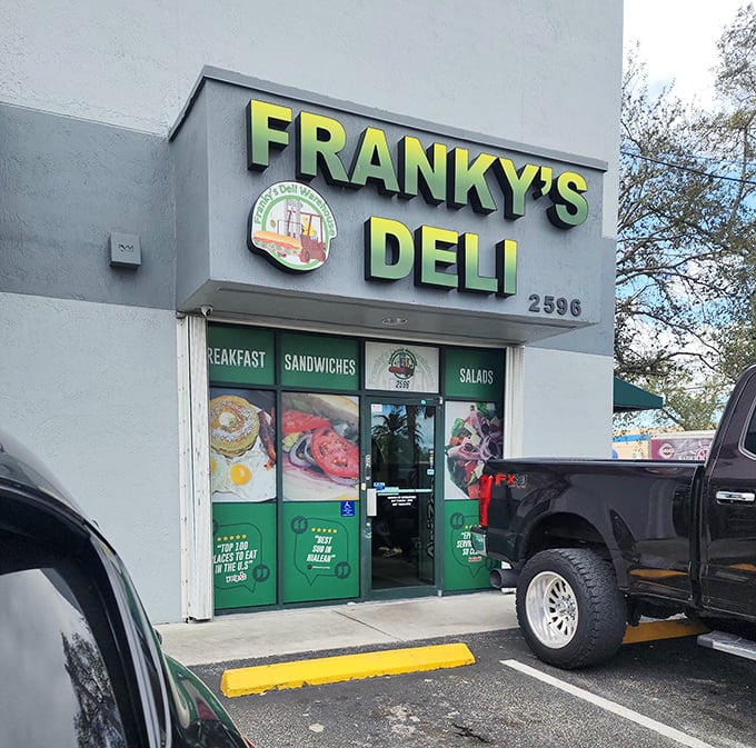 The green and yellow storefront hints at the fresh ingredients waiting inside this neighborhood gem.