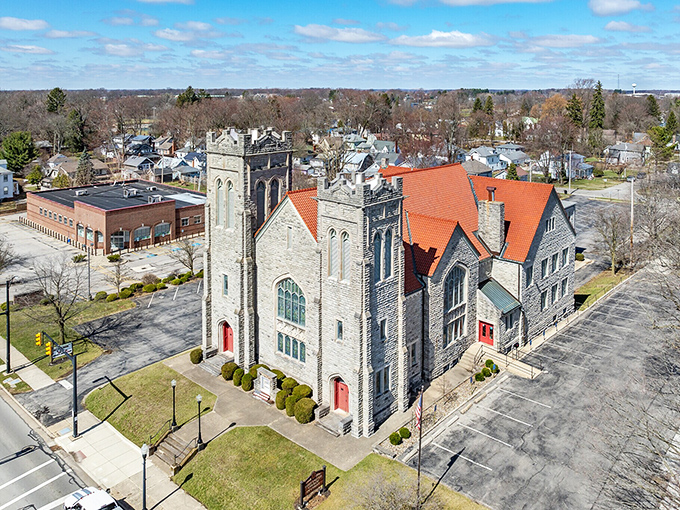 Stone churches and brick storefronts create a timeless streetscape that feels like coming home.