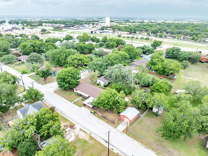 The bird's-eye view captures a community where wide-open spaces meet friendly neighborhood streets beautifully.