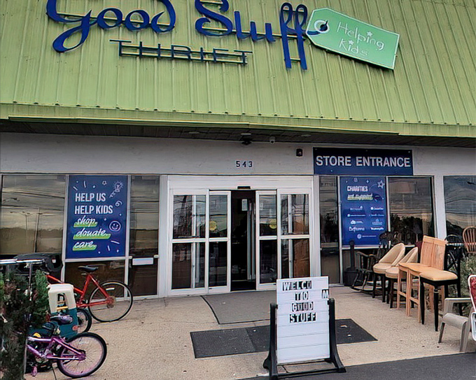 Bikes, chairs, and treasures await outside Good Stuff Thrift. The welcome sign says it all—good stuff indeed!