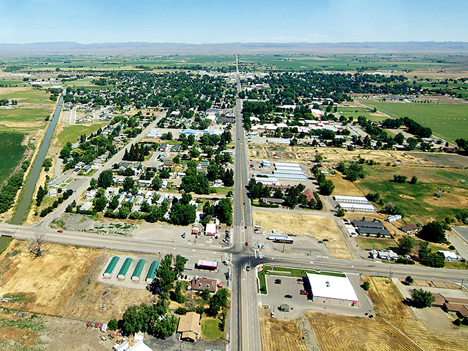 Bird's eye bargains! Gooding's grid-pattern perfection nestles between irrigated fields, offering retirement-friendly prices that would make even Warren Buffett nod in approval.