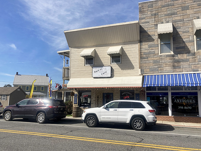 This downtown strip showcases the timeless appeal of small-town architecture mixed with modern convenience stores.