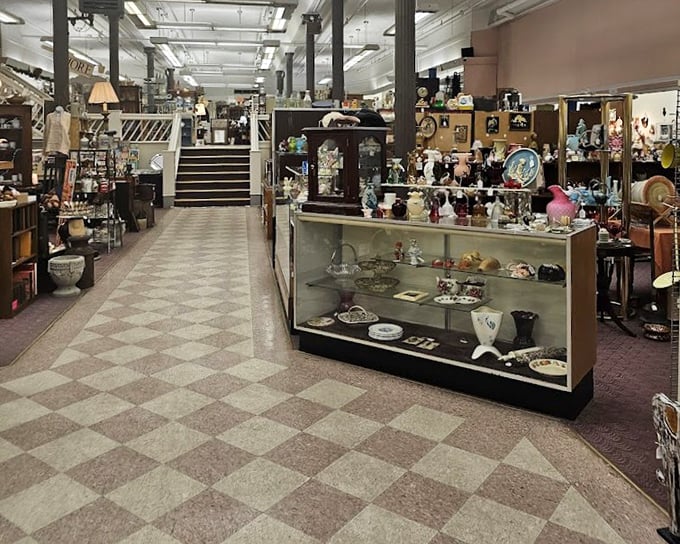 Display cases at Historica Plus showcase delicate treasures from bygone eras, each item whispering stories of its previous life.