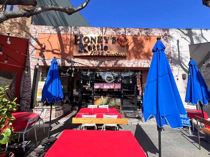 Those bright umbrellas signal good times ahead, where every bite delivers comfort food magic worth celebrating together.