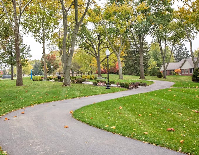 Tree-lined paths invite leisurely strolls where the biggest decision is which bench offers the best people-watching opportunities.