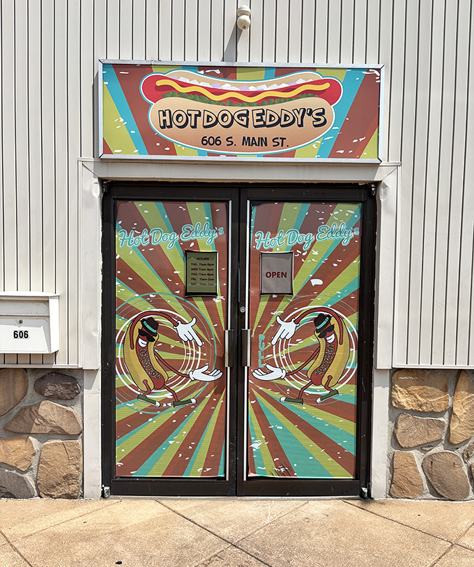 Talk about making an entrance! Hot Dog Eddy's rainbow explosion of color and cartoon dogs tells you this isn't your average wiener joint.