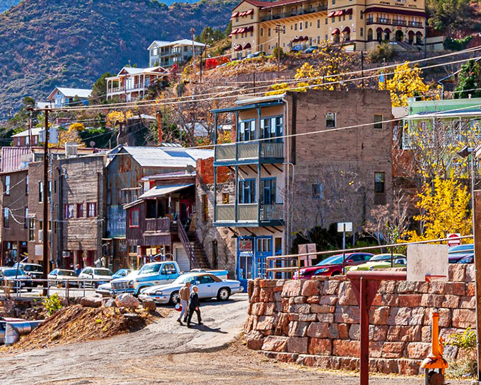 Jerome's hillside buildings cling to steep slopes like determined climbers refusing to let go.