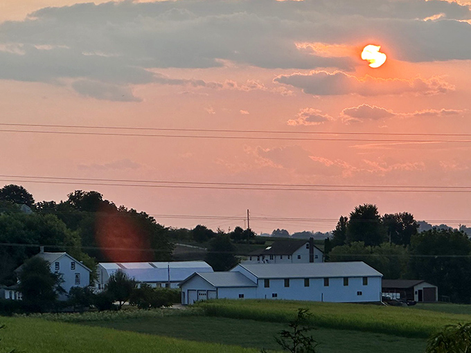 Golden sunset paints these simple white buildings, turning an ordinary evening into something absolutely magical.