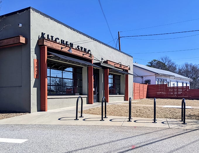 That bright orange canopy is like a beacon for hungry souls seeking affordable eats with upscale appeal.