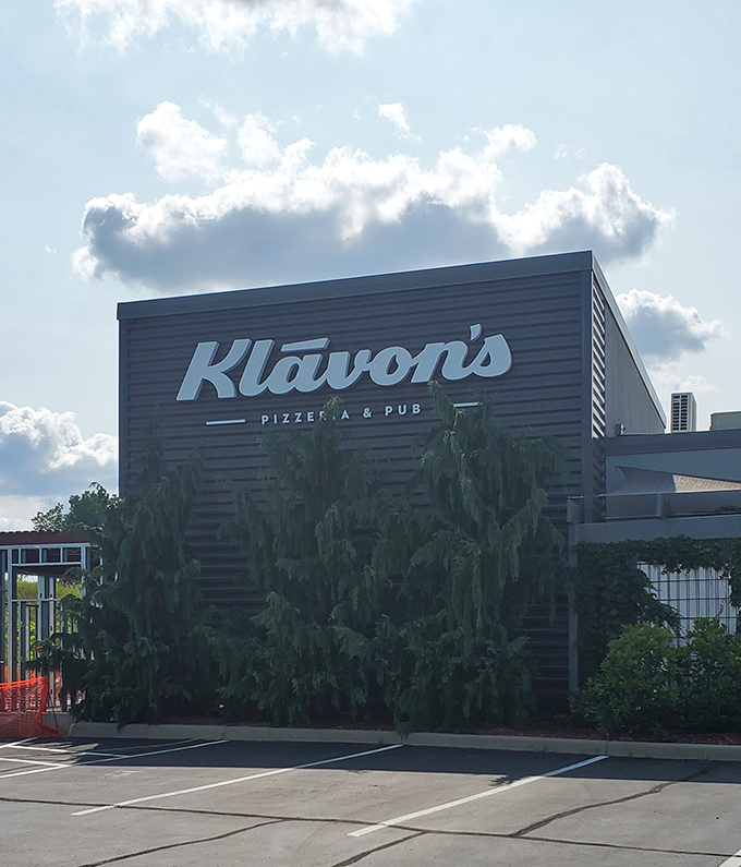 Clean lines and welcoming windows promise the kind of pizza experience that keeps communities coming back.