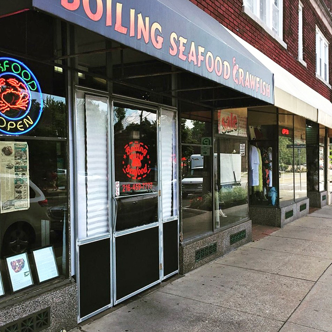 The unassuming entrance belies the aromatic symphony of spices and fresh seafood that awaits inside.