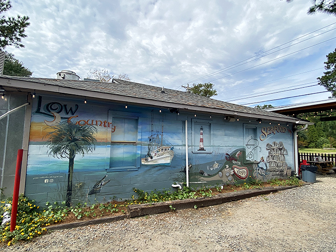 Behind that colorful mural lies a seafood sanctuary where tradition meets perfection on every plate.