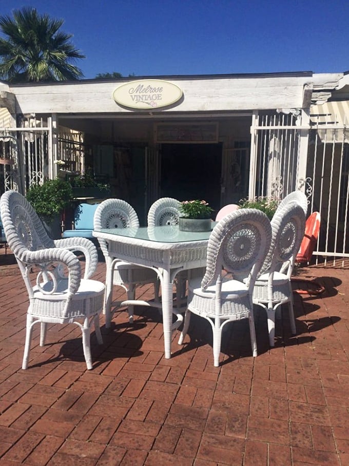 Wicker wonderland! This outdoor display at Melrose Vintage proves that yesterday's patio furniture still knows how to make a statement.