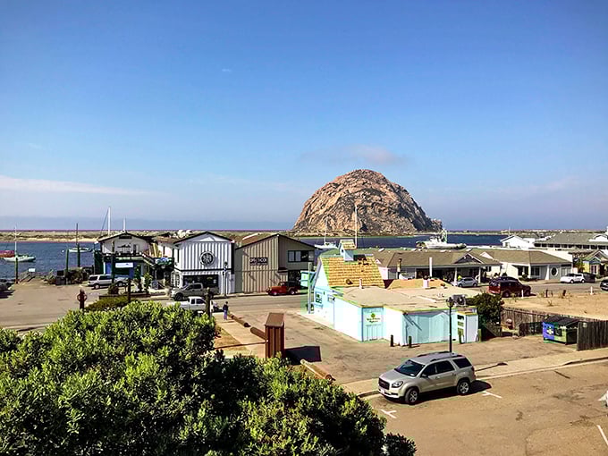 That iconic rock has been playing sentinel to this working harbor since long before Instagram existed.