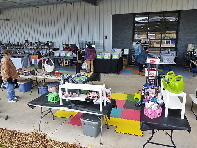 Colorful foam mats create organized spaces where vendors display everything from toys to household treasures galore.
