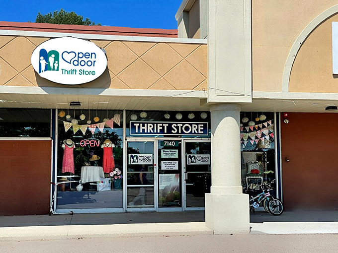 The cheerful Open Door sign promises exactly what it delivers: endless possibilities for savvy shoppers.