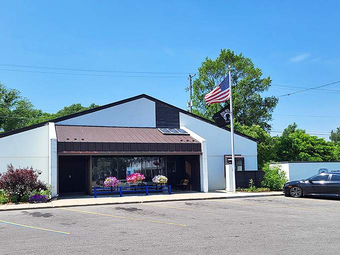 The Au Sable Lighthouse stands white and proud, a beacon for those seeking simpler times by the water.