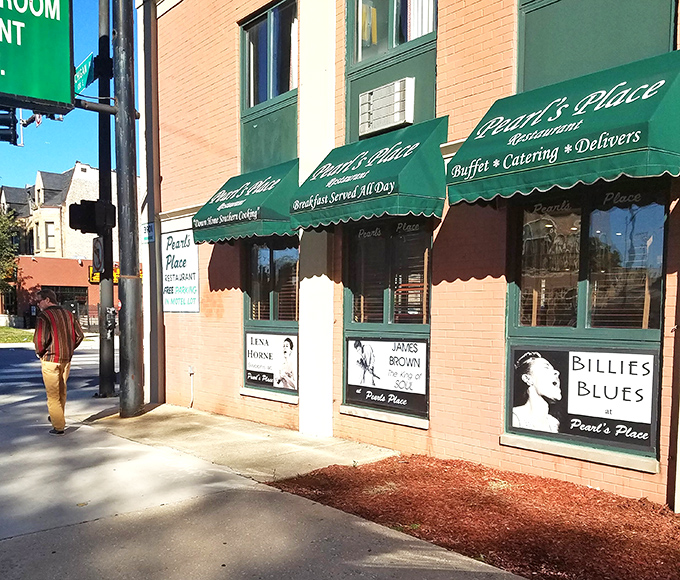 Green awnings and brick walls frame decades of soul food excellence on Michigan Avenue.