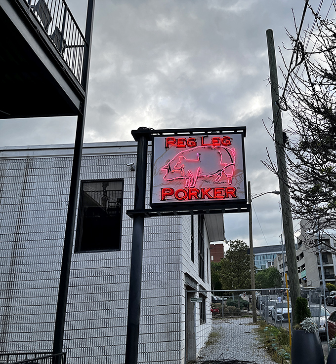 That glowing pig sign has guided more hungry souls than a lighthouse guides ships.