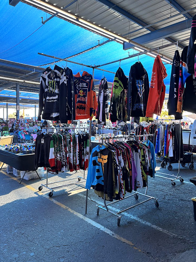 Fashion finds hang ready for their second act. In the desert heat, these racks of possibility await their perfect match.